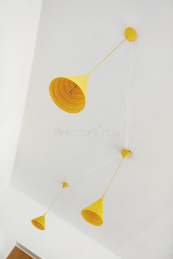 Yellow Chandeliers on Ceiling Stock Photo - Image of lamp, interior ...