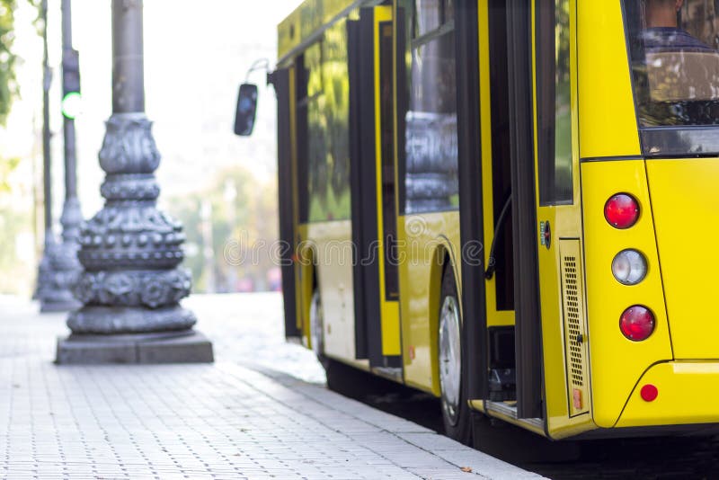 Modern Yellow City Bus with Open Doors at Bus Station Stock Image ...