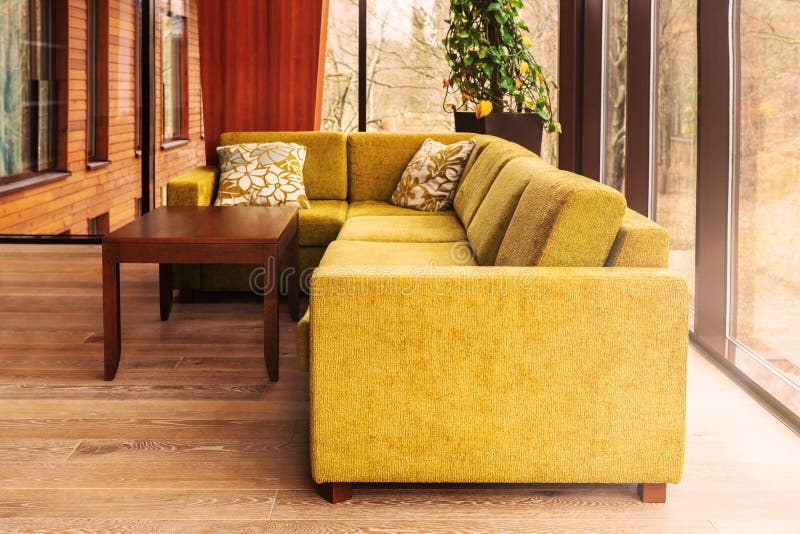 Modern Yellow Couch in a Natural Living Room Stock Image - Image of ...