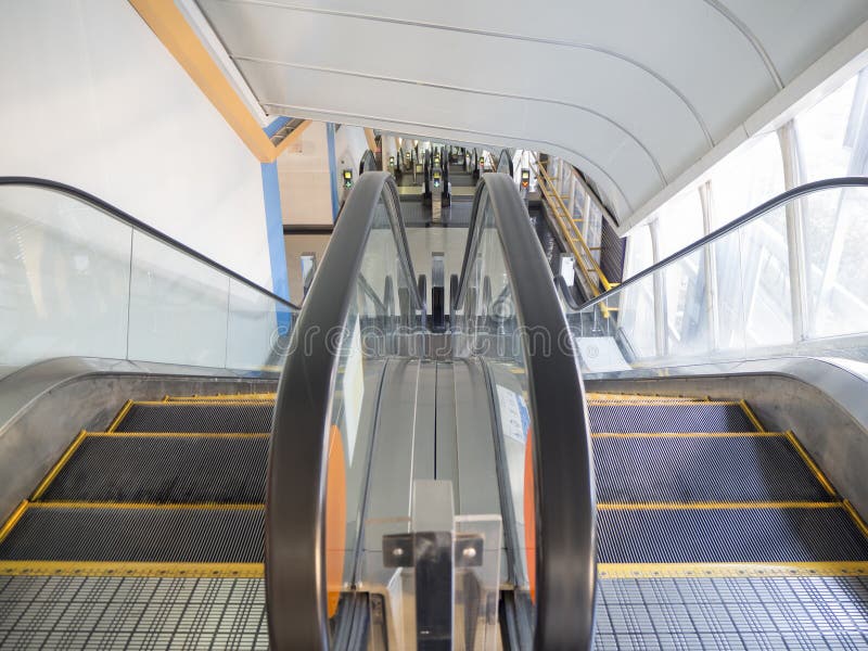Modern Yellow Line Escalator in Shopping Mall Stock Image - Image of ...