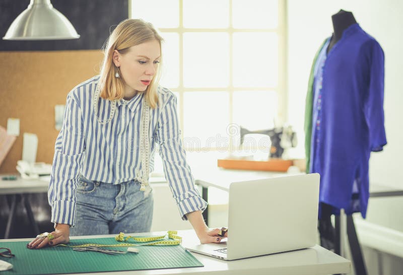 Young Fashion Designer Working at Studio. Stock Photo - Image of ...