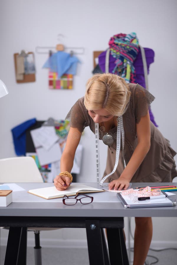 Modern Young Fashion Designer Working at Studio. Stock Photo - Image of ...