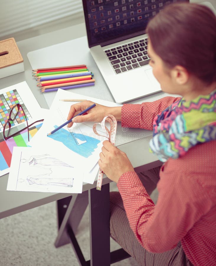 Modern Young Fashion Designer Working at Studio. Stock Photo - Image of ...