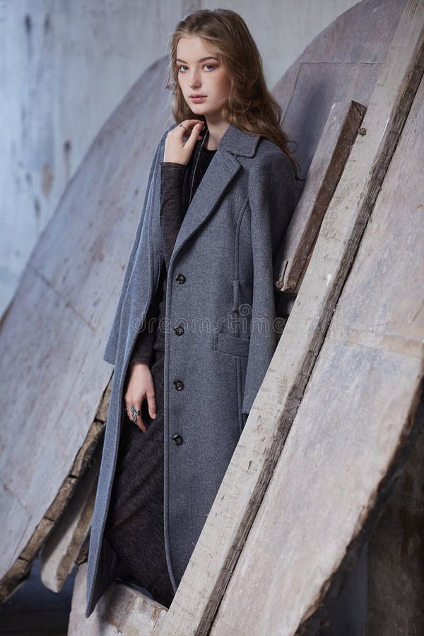 A Lady in a Long Grey Jacket. Stock Photo - Image of ethnicity ...