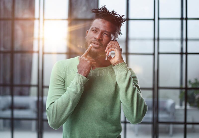 Modern Young Man with Mobile Phone in the Office. Stock Image - Image ...