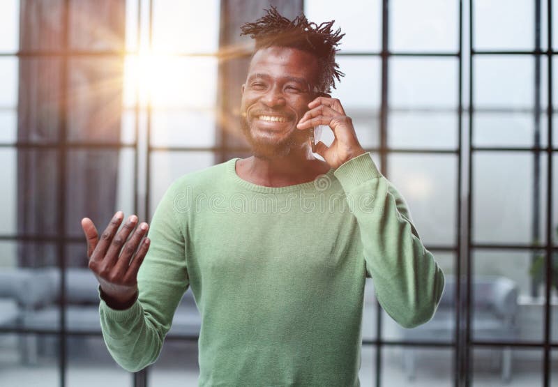 Modern Young Man with Mobile Phone in the Office. Stock Image - Image ...