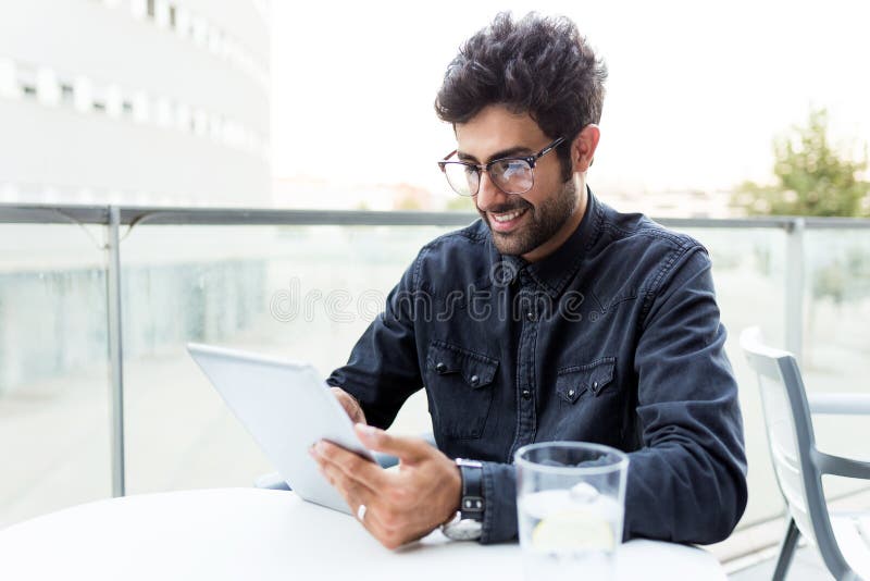 Modern Young Man Using His Digital Tablet in the Street. Stock Image ...