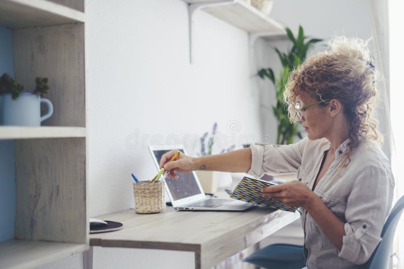 Modern Young Pretty Adult Lady Working at Home in Alternative Office ...