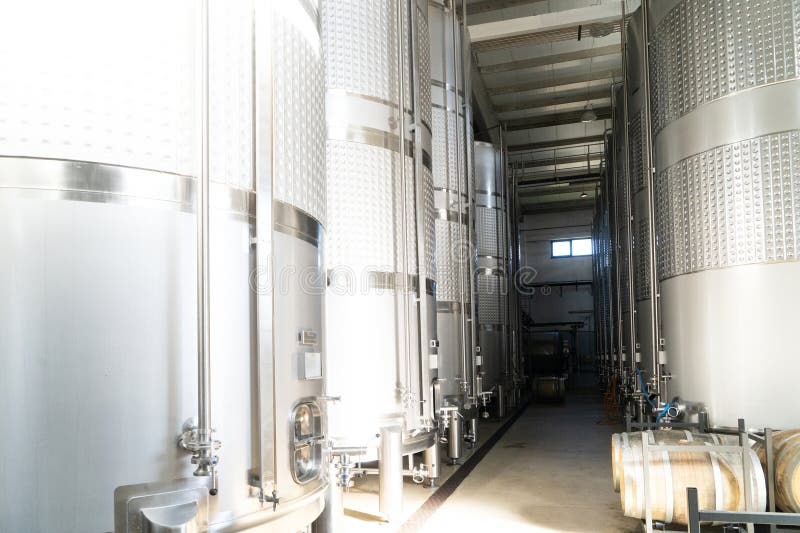 Modernt metal wine tanks stock image. Image of winebarrel - 333717313