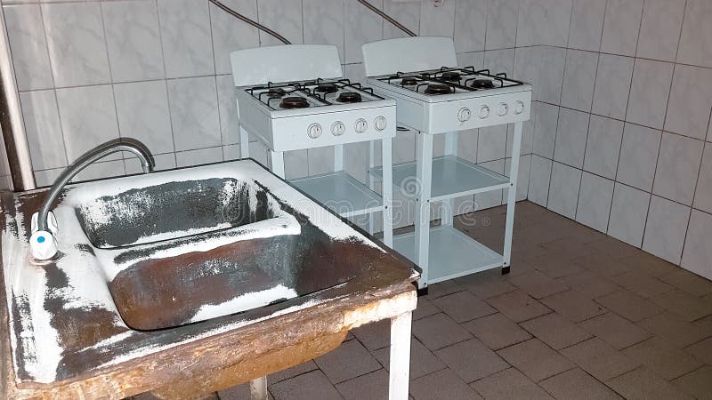 A Modest and Outdated Kitchen in a Student Dormitory. Old Equipment ...