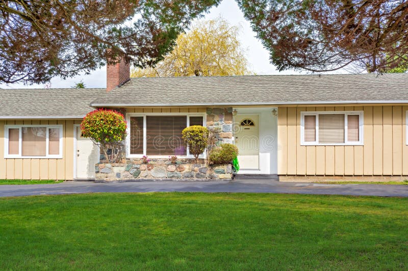 Modest Residential Duplex House in Canada with Green Lawn in Front ...