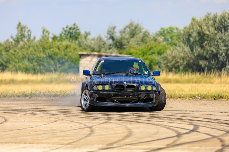 Black BMW Drifting with Intense Smoke Effect on Open Track. July 2 ...