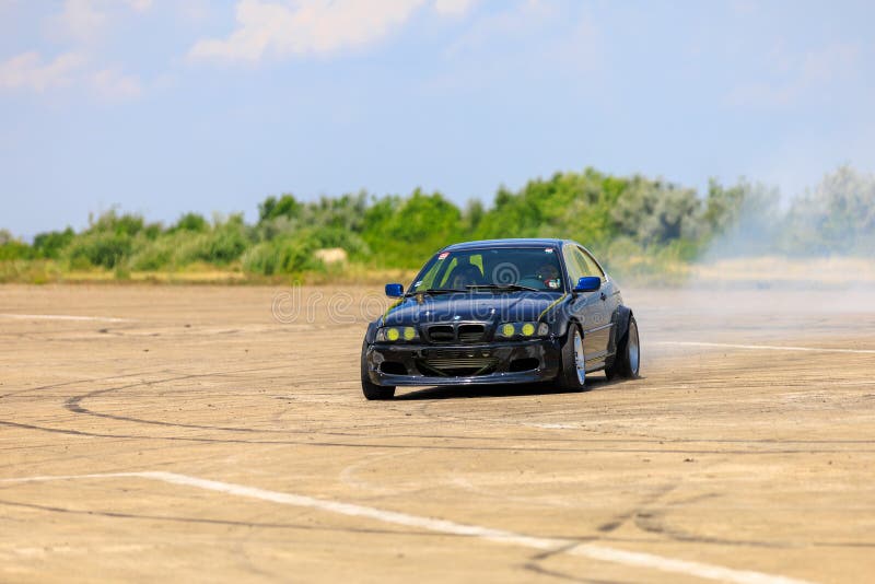 Black BMW Drifting with Intense Smoke Effect on Open Track. July 2 ...