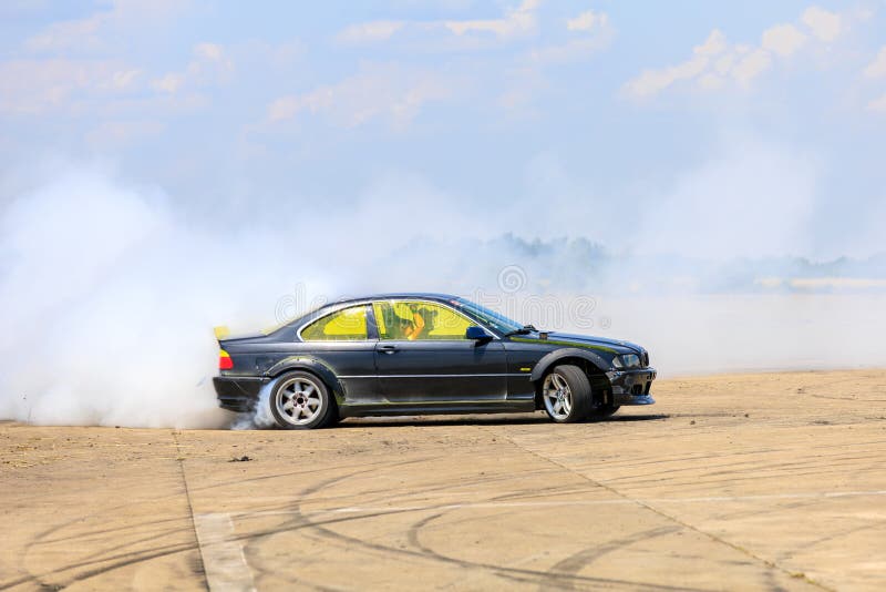 Black BMW Drifting with Intense Smoke Effect on Open Track. July 2 ...