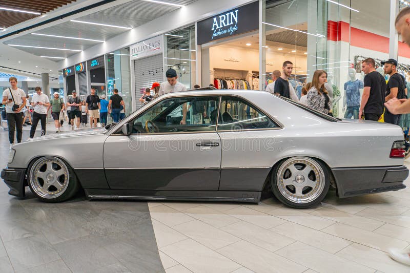 A Modified Dark-colored Car with a Body Kit, Wide Arches, and Custom ...