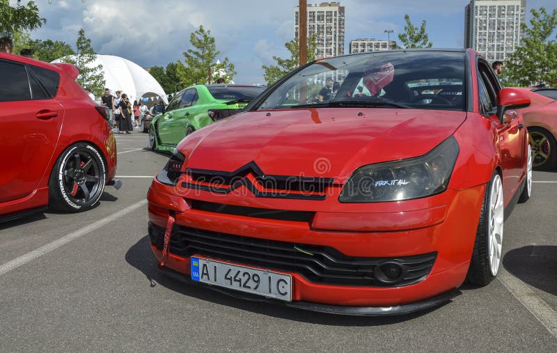 Modified Red Citroen C4, Showcasing Its Unique Style with Custom Wheels ...