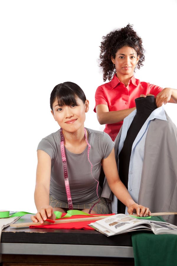 Trabajo De La Modista Con Una Tableta Digital En Su Taller Imagen de ...