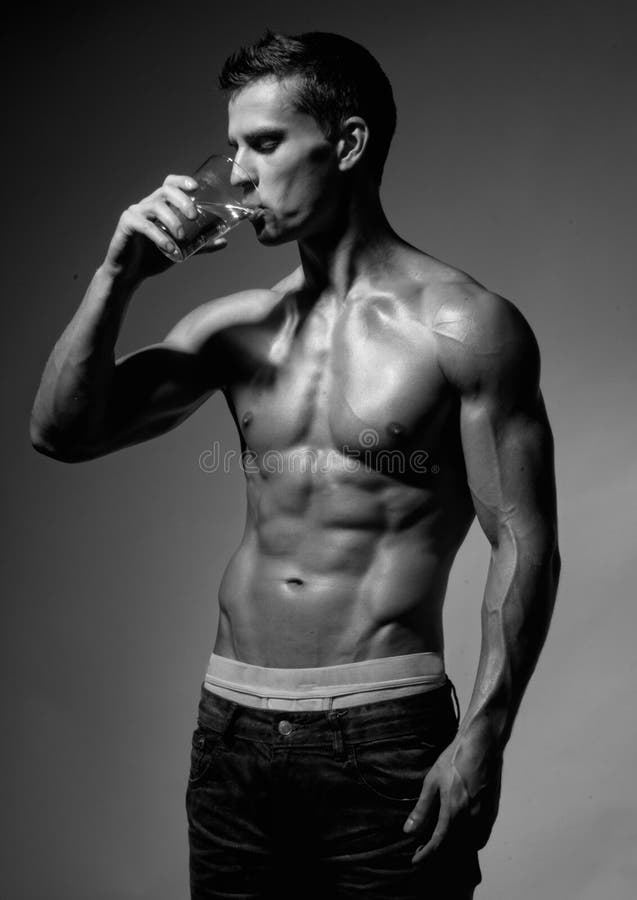 Modle with a glass stock image. Image of muscle, drinking - 78065073