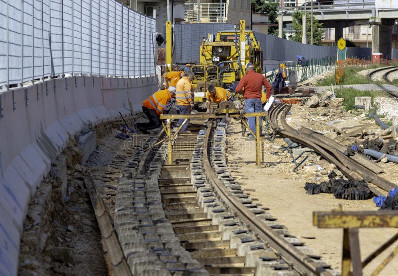 Construction Workers at Work at Railway Station. Editorial Stock Image ...