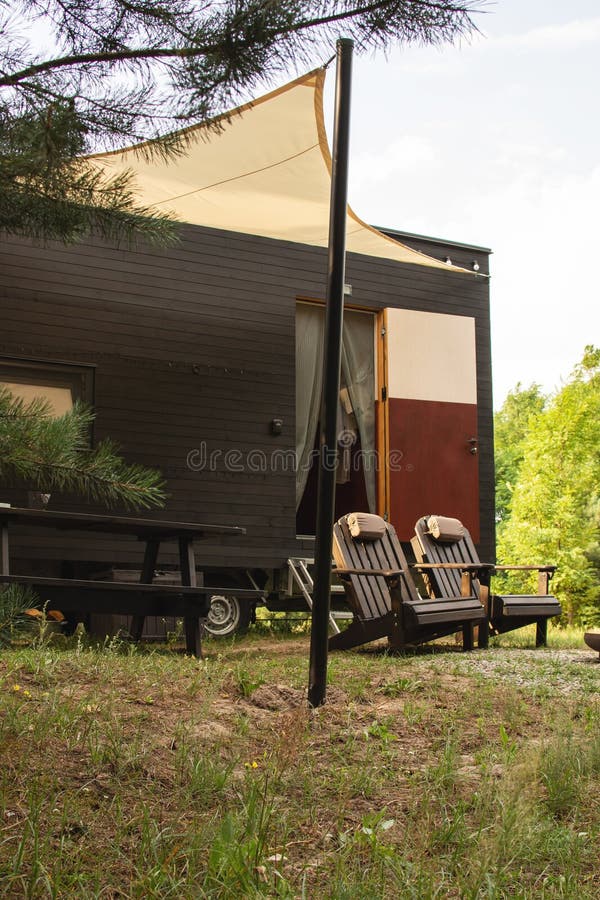 A Modular Frame-type Apartment on Wheels, Lined with Wood Against the ...