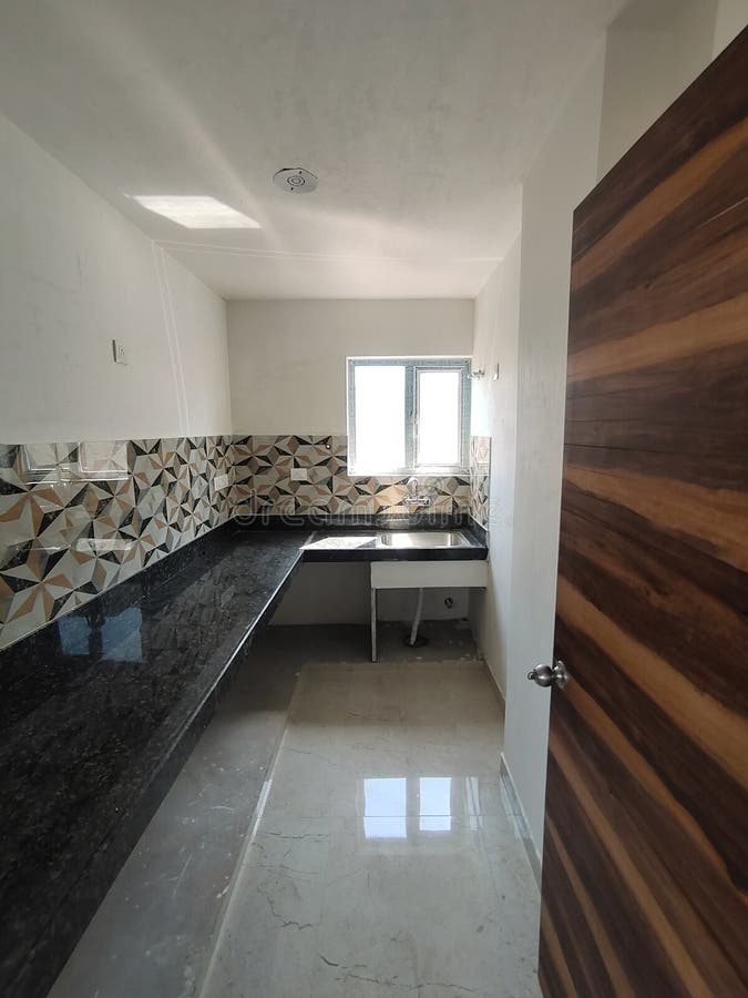 Modular Kitchen with Wooden Floor Type Tiles Stock Photo - Image of ...