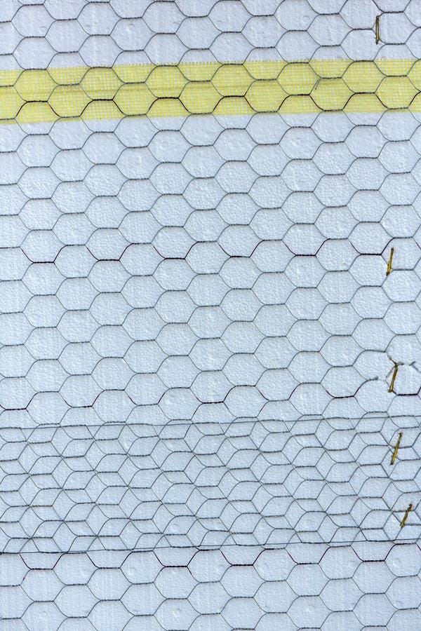 Moisture Resistant Foam Stucco Panels Covered in Overlapping Panels of ...