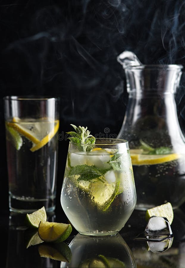 Mojito Cocktail In Glasses And A Glass Jar Stock Image - Image of ...
