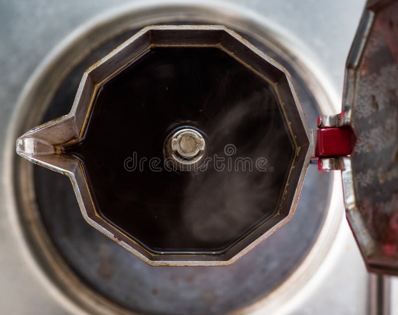 Moka Brewing Coffee. Top View Stock Photo - Image of italy, black ...