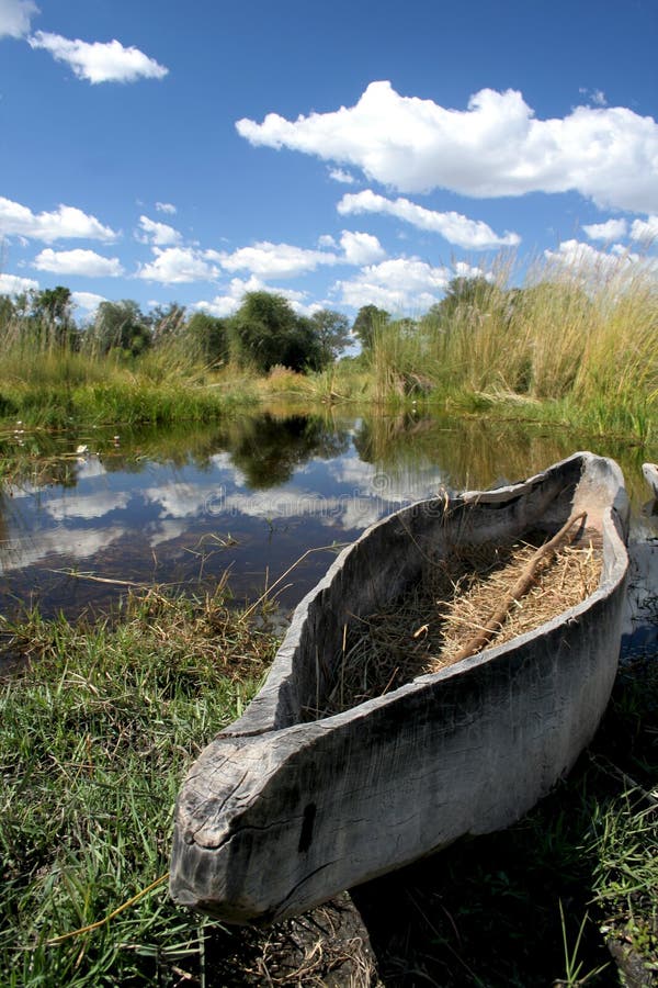 Mokoro at Dawn stock photo. Image of silhouette, water - 2445280
