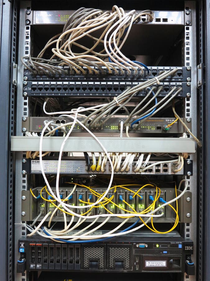 Racks with Telecommunication Equipment is in the Server Room of the ...
