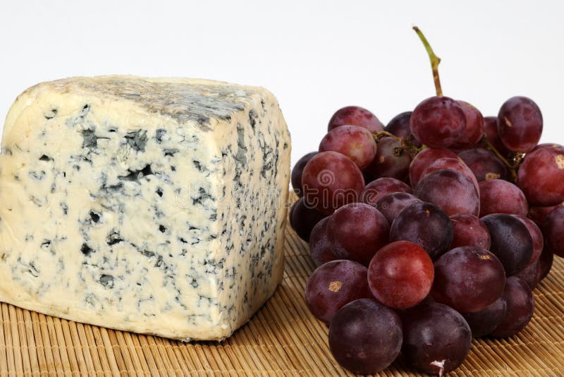 Blue cheese and grapes stock photo. Image of close, milk - 14384894