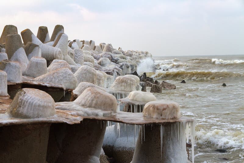 Mole in winter. stock image. Image of latvia, water - 102843227