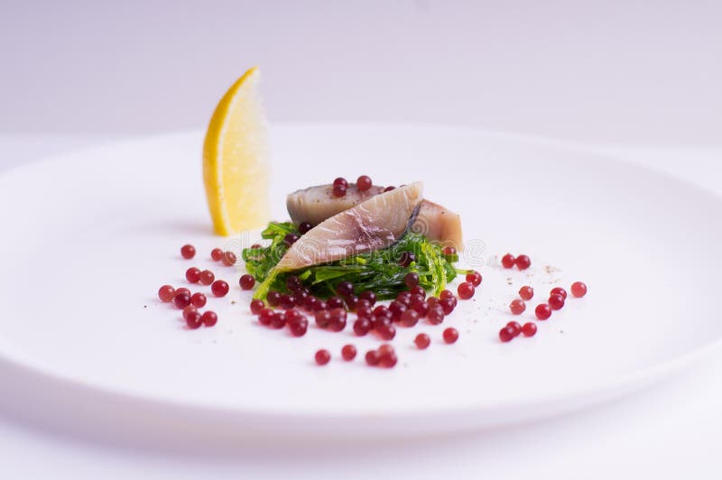 Molecular Beet Caviar, Mackerel Fish and Seaweed Stock Photo - Image of ...