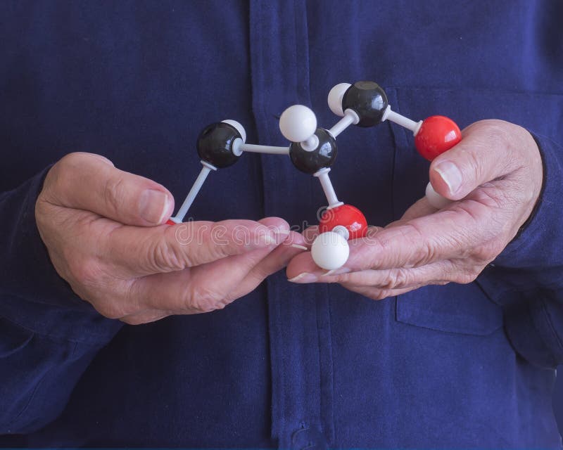 Scientist Holds a Molecule in His Hands for Demonstration To Illustrate ...