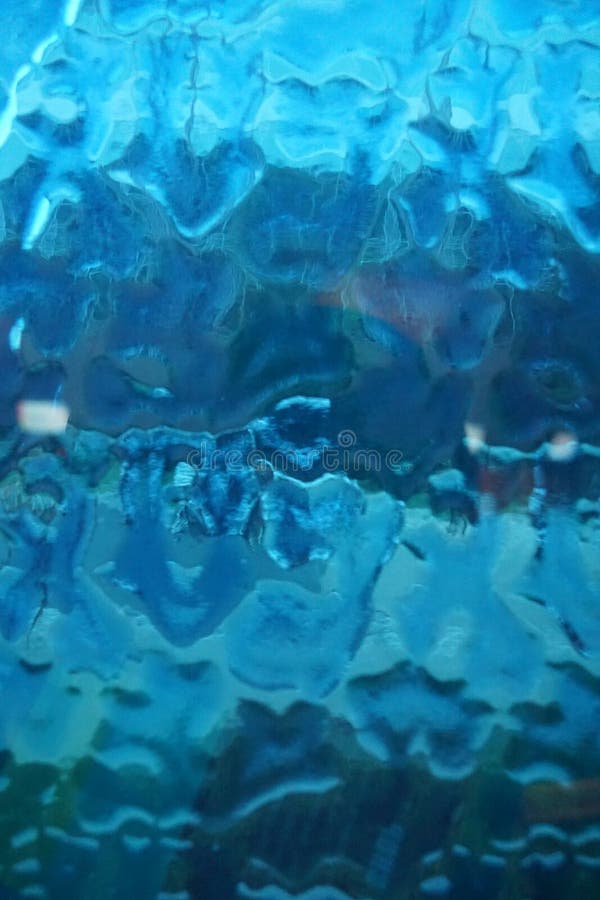 A Molten, Blue Glass Window Pane Stock Photo - Image of fused, glass ...