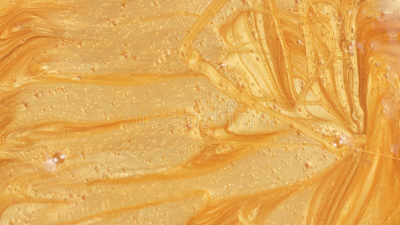 Molten Gold Slowly Slides Down. Macro Shot. Liquid Movement with ...
