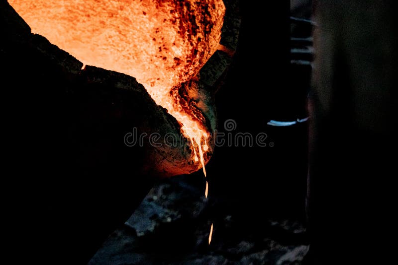 Molten Metal Flows Out of the Bucket Stock Image - Image of ...