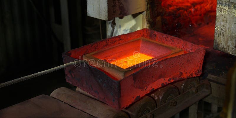 Molting gold at a factory stock photo. Image of liquid - 81028750