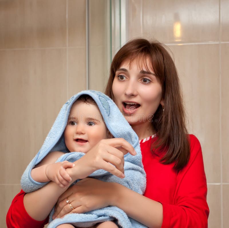 Mom and baby in a bathroom stock photo. Image of parent - 19610030