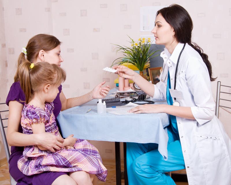 Mom and baby at the doctor stock photo. Image of medicine - 24697206