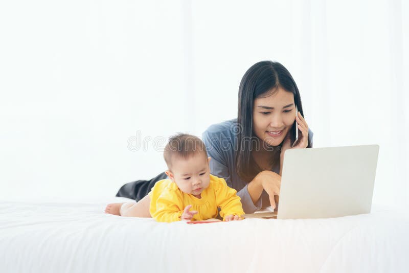 Mom and Baby with Laptop Computer Working from Home Stock Photo - Image ...