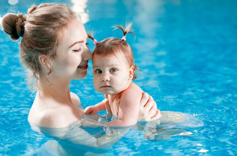 Mom and Baby Swim in the Pool. Stock Image - Image of pool, daughter ...