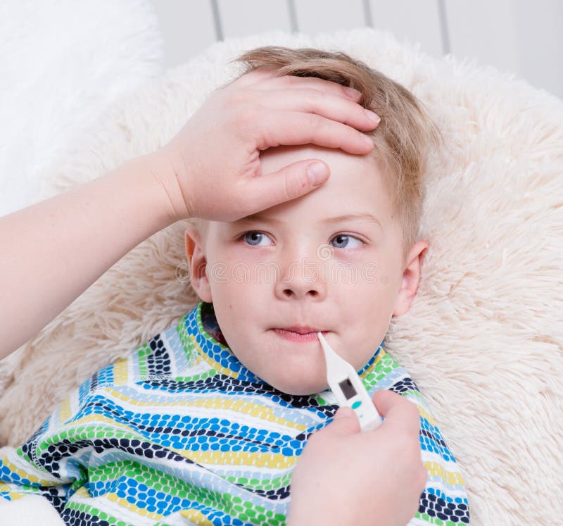 Mom Check the Temperature of a Sick Child Stock Photo - Image of ...