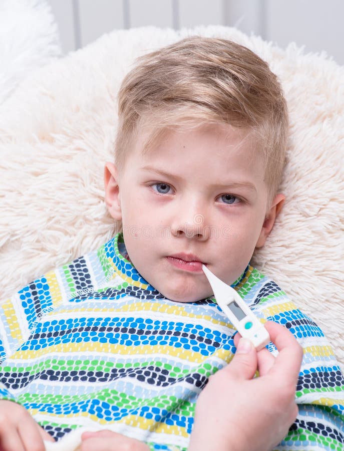 Mom Check the Temperature of a Sick Child Stock Image - Image of ...