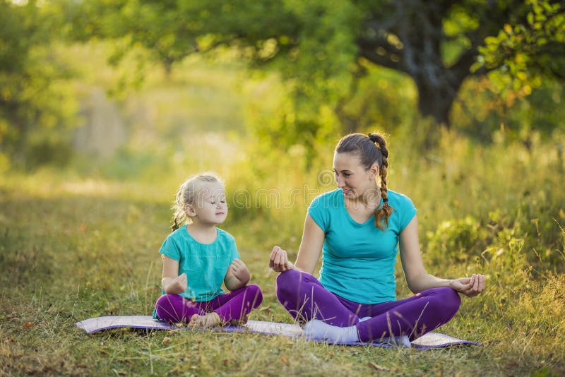 Mom and Child in the Lotus Position Stock Image - Image of baby, care ...