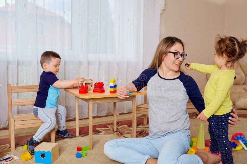 Mom and Children are Playing in the Room Stock Image - Image of female ...