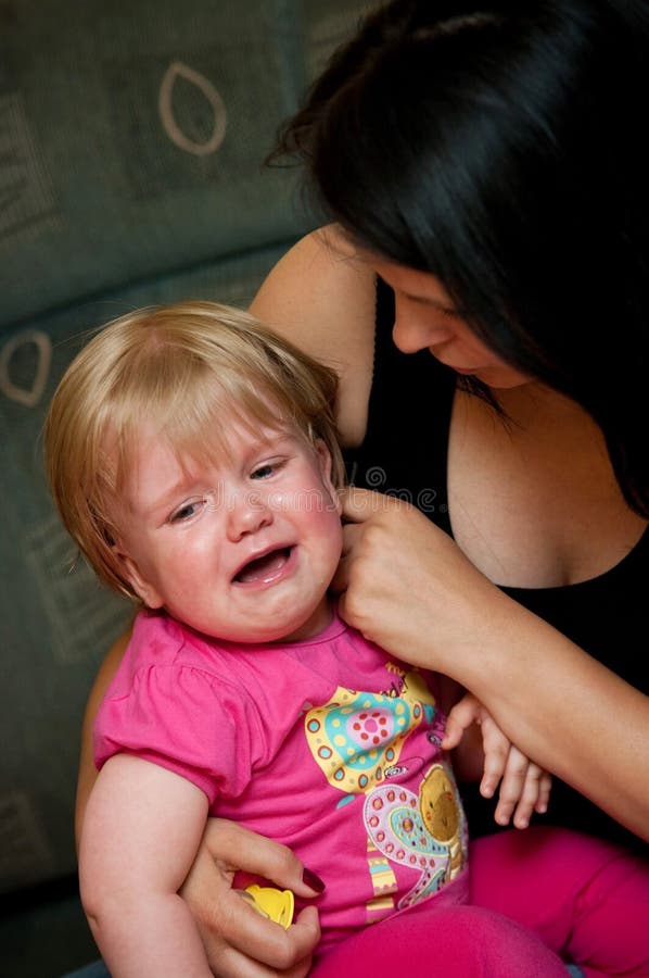 Mother and crying child stock image. Image of sadness - 26195287