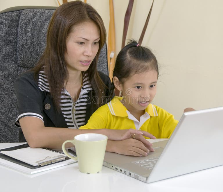 Mom and Daughter with Computer Stock Image - Image of helping, planning ...