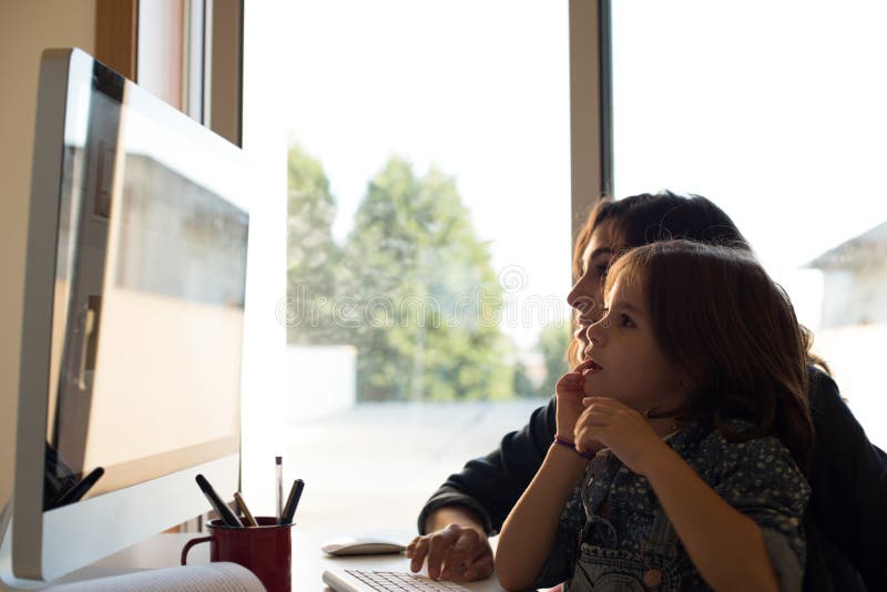 Mom and Daughter at the Computer Stock Photo - Image of teaching, adult ...