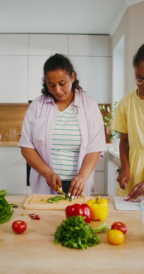 Mom and Daughter Cook in the Kitchen Stock Footage - Video of teenager ...